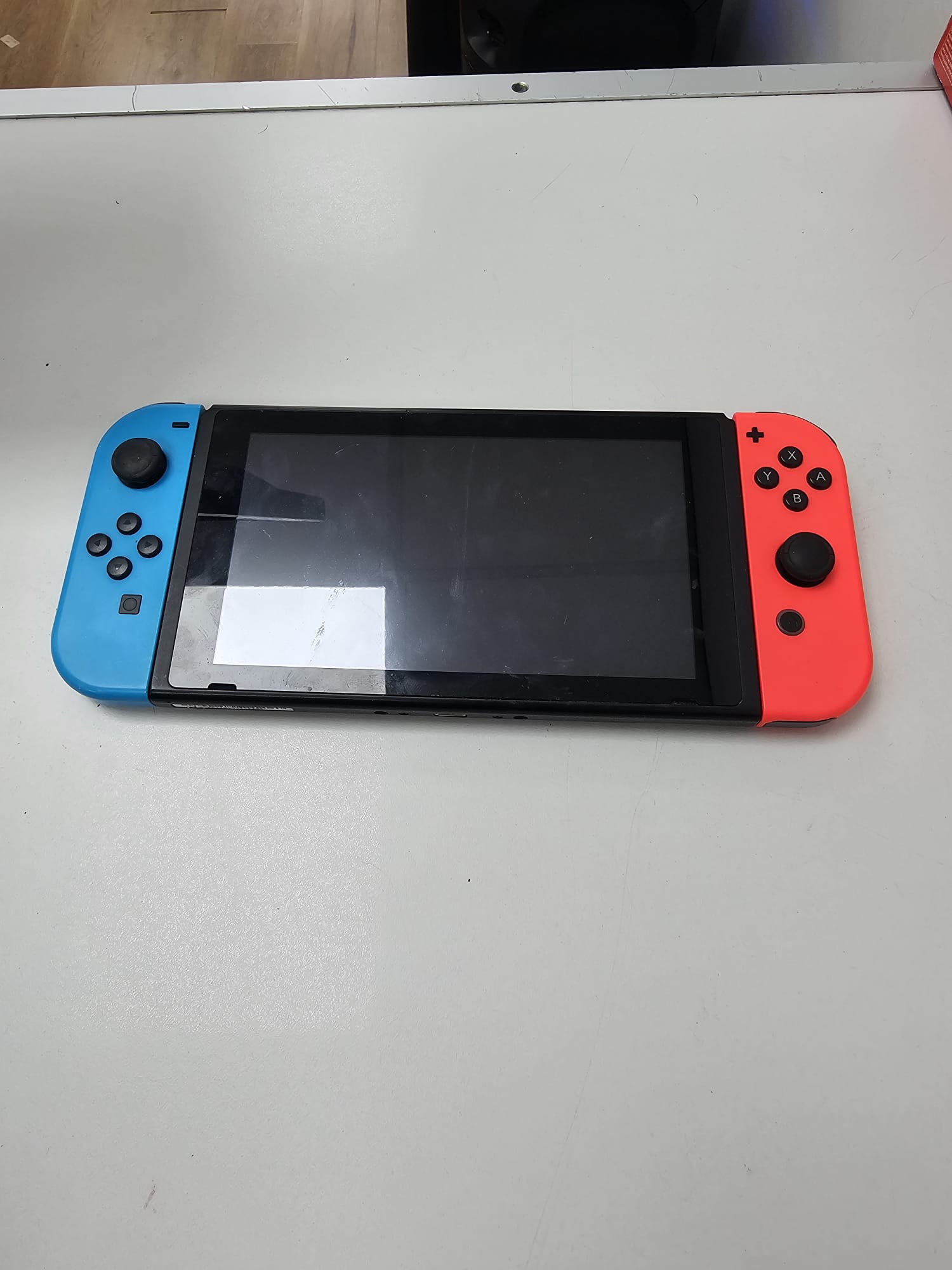 Pre-owned NINTENDO SWITCH V2 handheld console with Neon Red Blue ...
