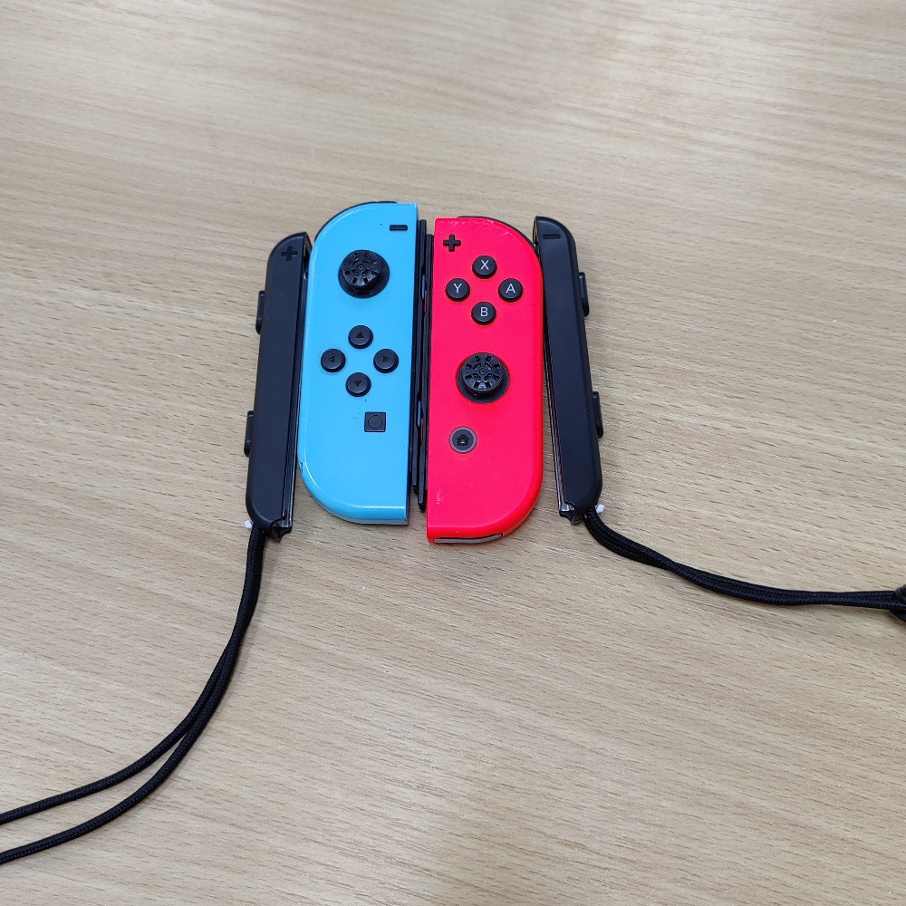 Pre-owned Nintendo Switch Joycons Blue & Red - Own4Less