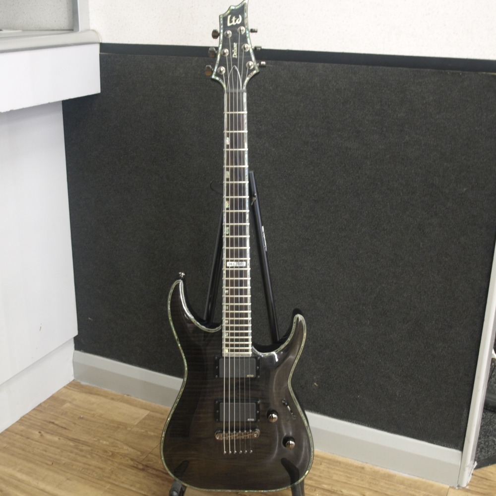 Pre-owned ESP LTD DELUXE H-1001 (See - thru Black) - Own4Less